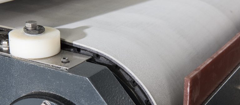 Precision grinding machine: stock removal of sheet metal - Timesavers