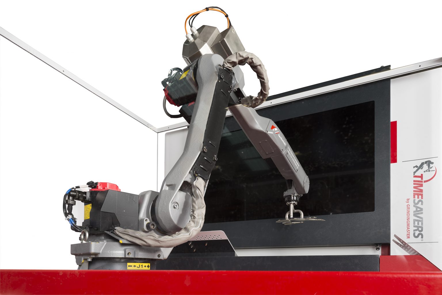 Automation of deburring machine with robots - Timesavers